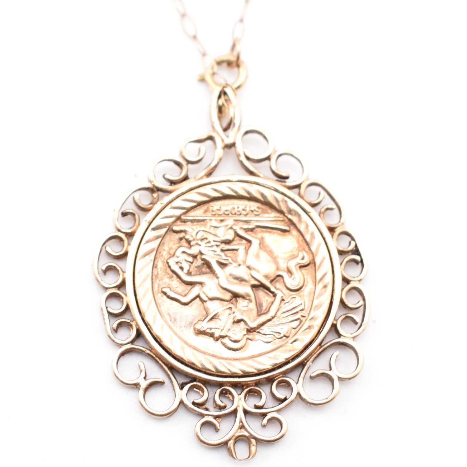 Lot 234 - 9CT GOLD MOUNTED REPLICA HALF SOVEREIGN