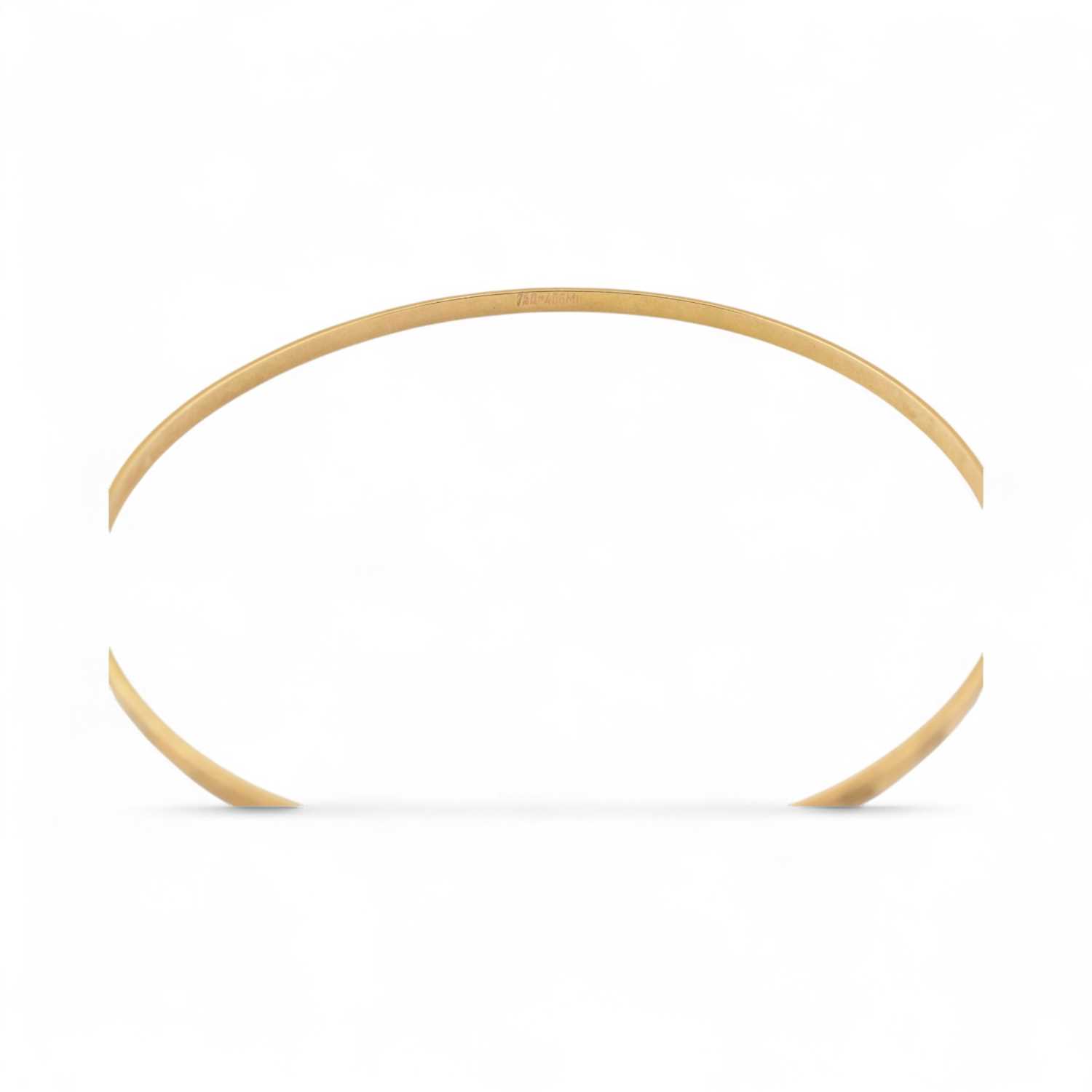 Lot 312 - 750 / 18CT GOLD MARKED ENGINE TURNED BANGLE